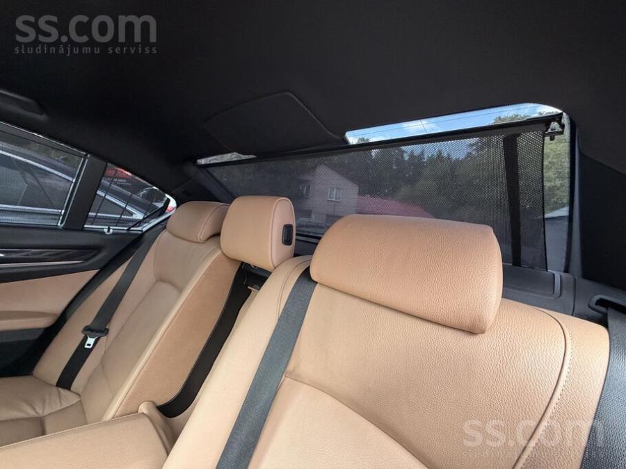 Grey BMW 730 2010 in Riga, with an engine capacity of 3.00 L and mileage of 340 thousand km for 6990 €, photo 21 on AUTOMOTO.COM.LV