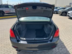 Grey BMW 730 2013 in Liepaja, with an engine capacity of 3.00 L and mileage of 244 thousand km for 12200 €, photo 10 on AUTOMOTO.COM.LV