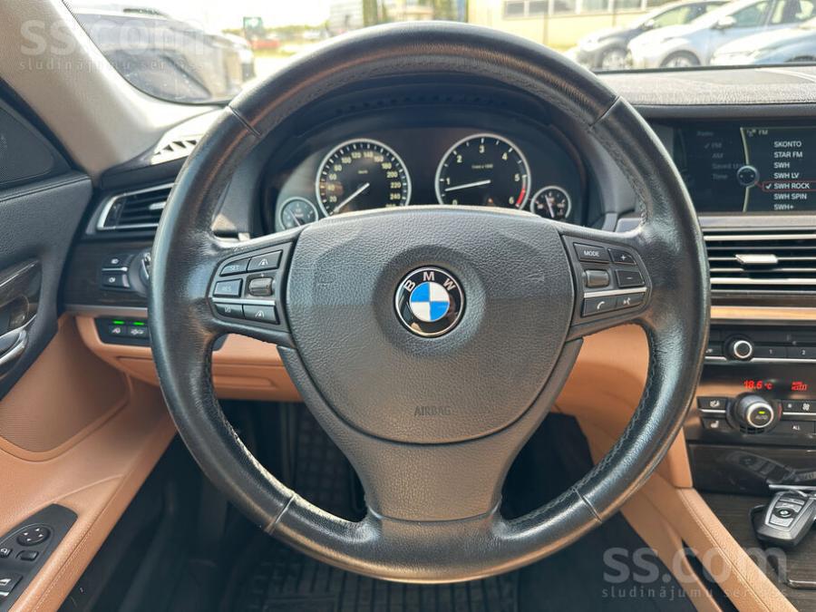 Grey BMW 730 2013 in Liepaja, with an engine capacity of 3.00 L and mileage of 244 thousand km for 12200 €, photo 13 on AUTOMOTO.COM.LV