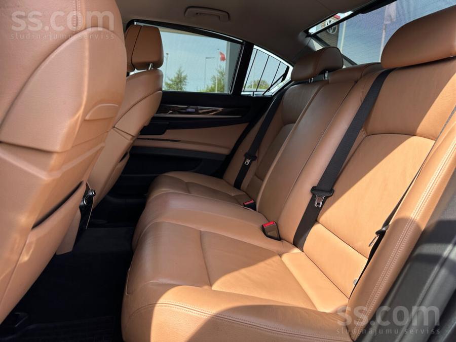 Grey BMW 730 2013 in Liepaja, with an engine capacity of 3.00 L and mileage of 244 thousand km for 12200 €, photo 22 on AUTOMOTO.COM.LV
