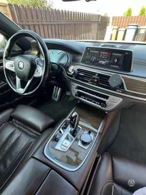 White BMW 730 2017 in Siauliai, with an engine capacity of 2.99 L and mileage of 504 thousand km for 21000 €, photo 20 on AUTOMOTO.COM.LV