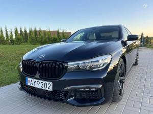 Black BMW 740 2016 in Alytus, with an engine capacity of 3.00 L and mileage of 166 thousand km for 19800 €, photo 6 on AUTOMOTO.COM.LV