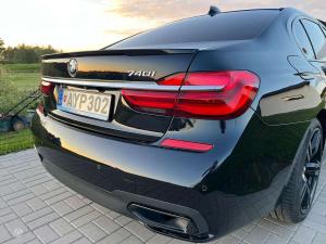 Black BMW 740 2016 in Alytus, with an engine capacity of 3.00 L and mileage of 166 thousand km for 19800 €, photo 12 on AUTOMOTO.COM.LV