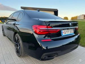 Black BMW 740 2016 in Alytus, with an engine capacity of 3.00 L and mileage of 166 thousand km for 19800 €, photo 14 on AUTOMOTO.COM.LV