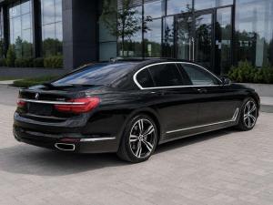 Black BMW 740 2017 in Vilnius, with an engine capacity of 3.00 L and mileage of 188 thousand km for 19350 €, photo 4 on AUTOMOTO.COM.LV