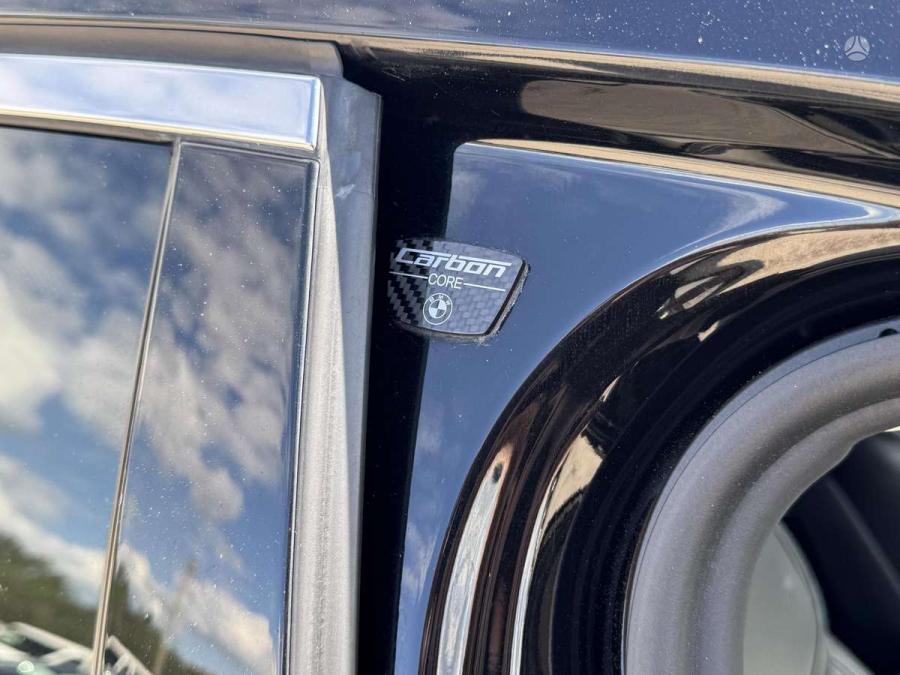 Black BMW 740 2017 in Vilnius, with an engine capacity of 3.00 L and mileage of 188 thousand km for 19350 €, photo 19 on AUTOMOTO.COM.LV