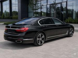 Black BMW 740 2017 in Vilnius, with an engine capacity of 3.00 L and mileage of 188 thousand km for 19350 €, photo 4 on AUTOMOTO.COM.LV