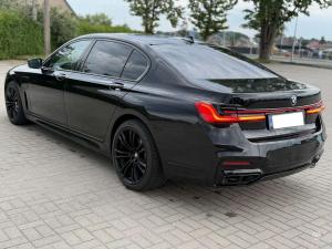 Black BMW 740 2019 in Taurage, with an engine capacity of 0.00 L and mileage of 118 thousand km for 30999 €, photo 8 on AUTOMOTO.COM.LV