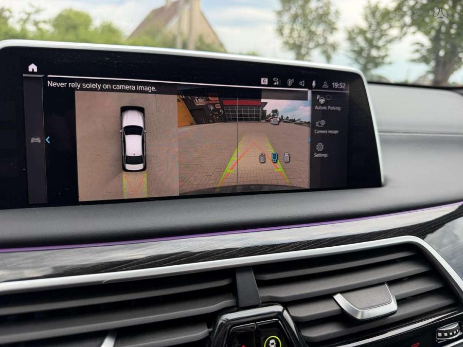 Black BMW 740 2019 in Taurage, with an engine capacity of 0.00 L and mileage of 118 thousand km for 30999 €, photo 16 on AUTOMOTO.COM.LV
