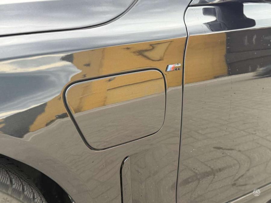Black BMW 740 2019 in Taurage, with an engine capacity of 0.00 L and mileage of 118 thousand km for 30999 €, photo 21 on AUTOMOTO.COM.LV
