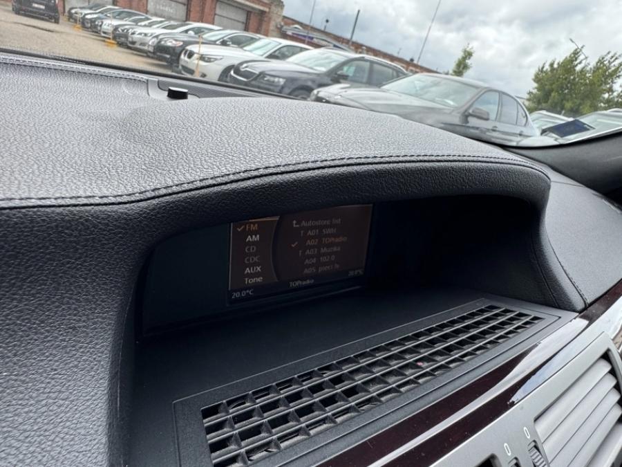 Black BMW 740 2007 in Riga, with an engine capacity of 4.00 L and mileage of 69 thousand km for 7490 €, photo 8 on AUTOMOTO.COM.LV