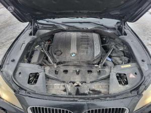 Black BMW 740 2009 in Kaunas, with an engine capacity of 2.99 L and mileage of 514 thousand km for 5450 €, photo 12 on AUTOMOTO.COM.LV