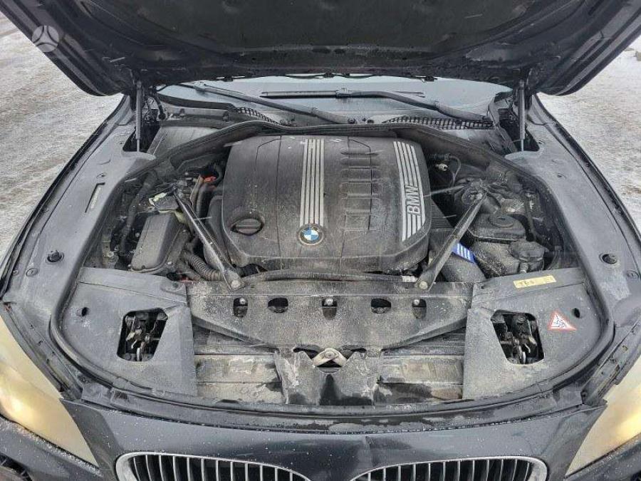 Black BMW 740 2009 in Kaunas, with an engine capacity of 2.99 L and mileage of 514 thousand km for 5450 €, photo 12 on AUTOMOTO.COM.LV
