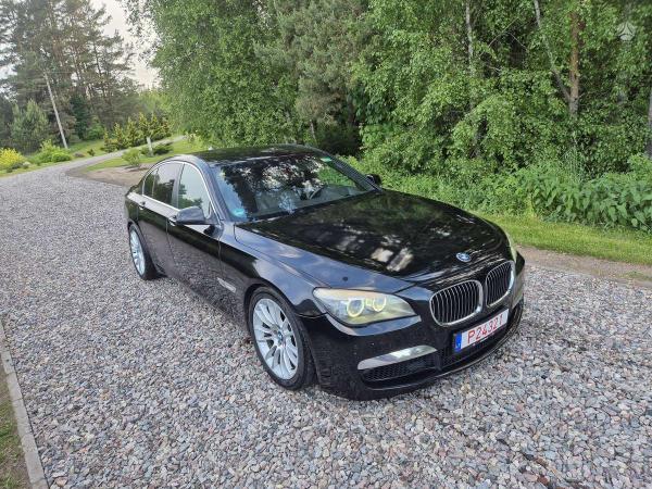 Black BMW 740 2009 in Svencionys, with an engine capacity of 2.99 L and mileage of 316 thousand km for 6800 €, photo 8 on AUTOMOTO.COM.LV