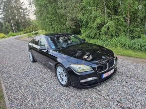 Black BMW 740 2009 in Svencionys, with an engine capacity of 2.99 L and mileage of 316 thousand km for 6800 €, photo 9 on AUTOMOTO.COM.LV