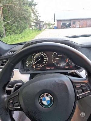 Black BMW 740 2009 in Svencionys, with an engine capacity of 2.99 L and mileage of 316 thousand km for 6800 €, photo 14 on AUTOMOTO.COM.LV