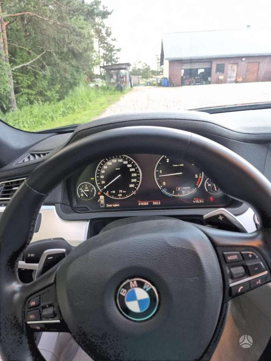 Black BMW 740 2009 in Svencionys, with an engine capacity of 2.99 L and mileage of 316 thousand km for 6800 €, photo 14 on AUTOMOTO.COM.LV