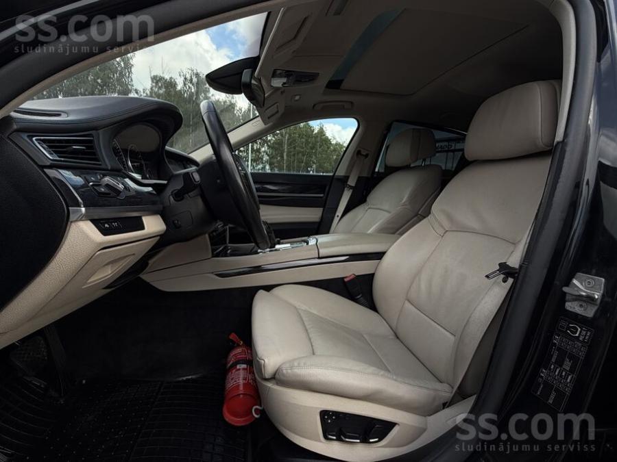 Melns BMW 740 2009 Rīga, ar dzinēja tilpumu 3.00 L un nobraukumu 289 tūkst. km par 10990 €, foto 10 vietnē AUTOMOTO.COM.LV