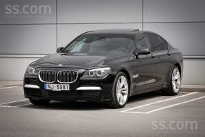 Black BMW 740 2010 in Riga, with an engine capacity of 3.00 L and mileage of 366 thousand km for 8995 €, photo  on AUTOMOTO.COM.LV