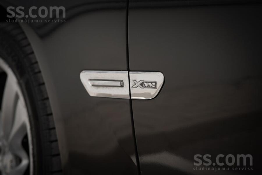 Black BMW 740 2010 in Riga, with an engine capacity of 3.00 L and mileage of 366 thousand km for 8995 €, photo 10 on AUTOMOTO.COM.LV
