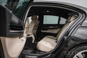 Black BMW 740 2010 in Riga, with an engine capacity of 3.00 L and mileage of 366 thousand km for 8995 €, photo 15 on AUTOMOTO.COM.LV