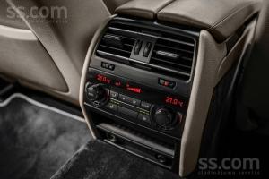 Black BMW 740 2010 in Riga, with an engine capacity of 3.00 L and mileage of 366 thousand km for 8995 €, photo 18 on AUTOMOTO.COM.LV