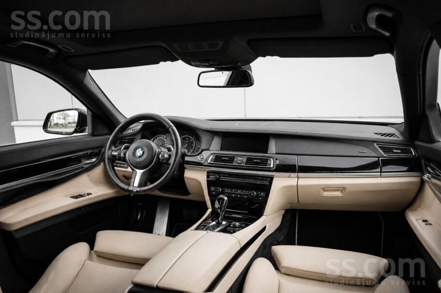 Black BMW 740 2010 in Riga, with an engine capacity of 3.00 L and mileage of 366 thousand km for 8995 €, photo 19 on AUTOMOTO.COM.LV