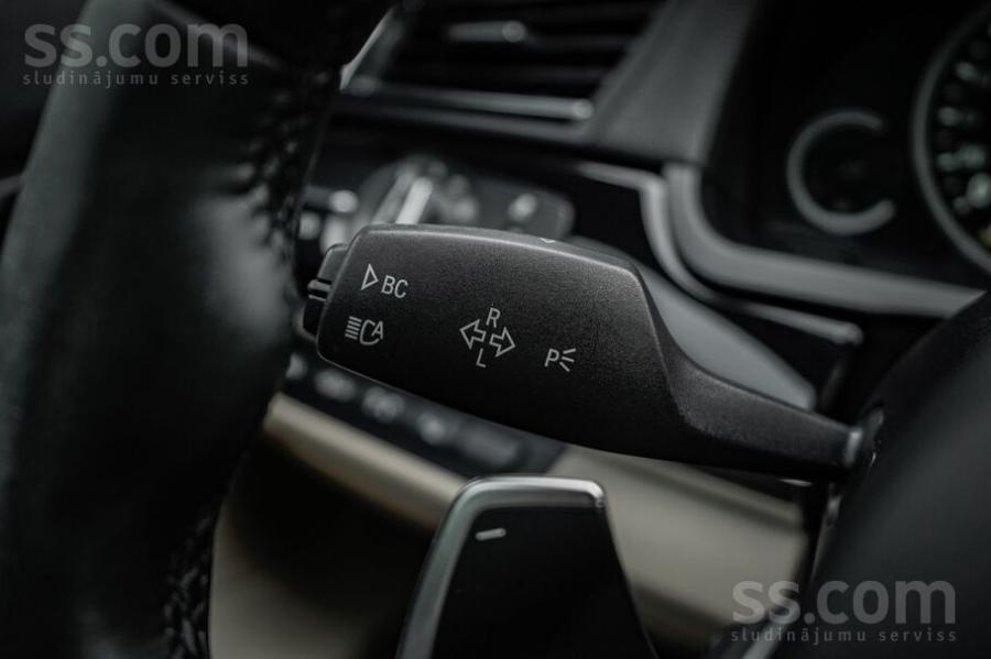 Black BMW 740 2010 in Riga, with an engine capacity of 3.00 L and mileage of 366 thousand km for 8995 €, photo 20 on AUTOMOTO.COM.LV