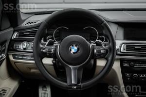 Black BMW 740 2010 in Riga, with an engine capacity of 3.00 L and mileage of 366 thousand km for 8995 €, photo 22 on AUTOMOTO.COM.LV