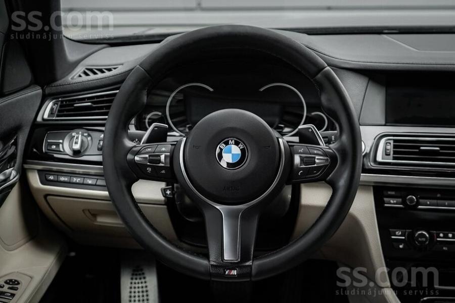 Black BMW 740 2010 in Riga, with an engine capacity of 3.00 L and mileage of 366 thousand km for 8995 €, photo 22 on AUTOMOTO.COM.LV