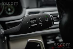 Black BMW 740 2010 in Riga, with an engine capacity of 3.00 L and mileage of 366 thousand km for 8995 €, photo 24 on AUTOMOTO.COM.LV