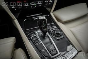Black BMW 740 2010 in Riga, with an engine capacity of 3.00 L and mileage of 366 thousand km for 8995 €, photo 25 on AUTOMOTO.COM.LV