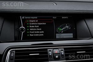 Black BMW 740 2010 in Riga, with an engine capacity of 3.00 L and mileage of 366 thousand km for 8995 €, photo 27 on AUTOMOTO.COM.LV