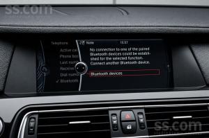 Black BMW 740 2010 in Riga, with an engine capacity of 3.00 L and mileage of 366 thousand km for 8995 €, photo 28 on AUTOMOTO.COM.LV