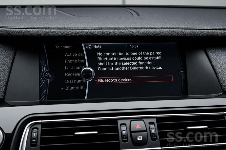 Black BMW 740 2010 in Riga, with an engine capacity of 3.00 L and mileage of 366 thousand km for 8995 €, photo 28 on AUTOMOTO.COM.LV
