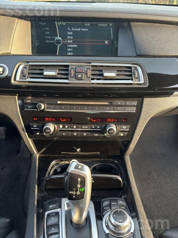 Black BMW 740 2010 in Rezekne, with an engine capacity of 3.00 L and mileage of 405 thousand km for 8350 €, photo 6 on AUTOMOTO.COM.LV