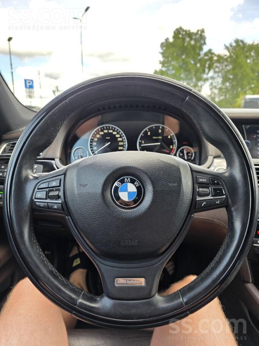 Black BMW 740 2010 in Riga, with an engine capacity of 3.00 L and mileage of 291 thousand km for 11500 €, photo 15 on AUTOMOTO.COM.LV