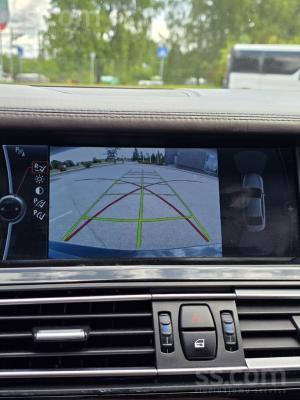 Black BMW 740 2010 in Riga, with an engine capacity of 3.00 L and mileage of 291 thousand km for 11500 €, photo 17 on AUTOMOTO.COM.LV