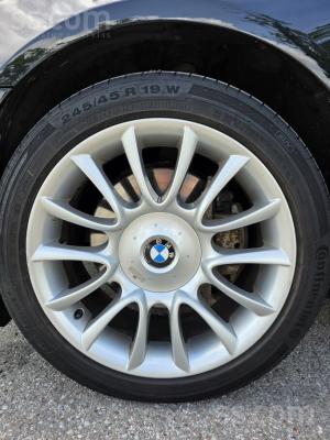 Black BMW 740 2010 in Riga, with an engine capacity of 3.00 L and mileage of 291 thousand km for 11500 €, photo 18 on AUTOMOTO.COM.LV