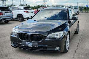 Black BMW 740 2010 in Marijampole, with an engine capacity of 2.99 L and mileage of 309 thousand km for 11950 €, photo 5 on AUTOMOTO.COM.LV