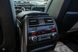 Black BMW 740 2010 in Marijampole, with an engine capacity of 2.99 L and mileage of 309 thousand km for 11950 €, photo 35 on AUTOMOTO.COM.LV