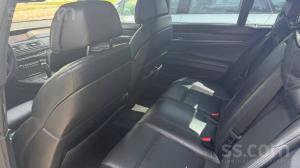 Black BMW 740 2010 in Riga, with an engine capacity of 3.00 L and mileage of 262 thousand km for 12400 €, photo 5 on AUTOMOTO.COM.LV