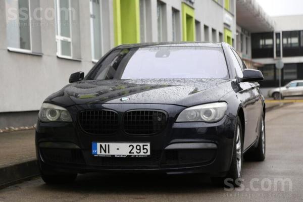 Black BMW 740 2010 in Riga, with an engine capacity of 3.00 L and mileage of 411 thousand km for 8495 €, photo 1 on AUTOMOTO.COM.LV