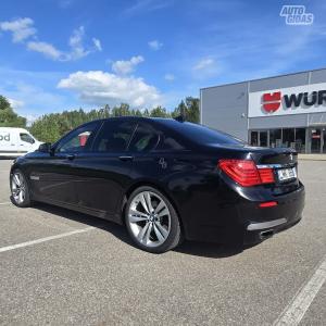 Black BMW 740 2010 in Utena, with an engine capacity of 3.00 L and mileage of 396 thousand km for 8200 €, photo 20 on AUTOMOTO.COM.LV