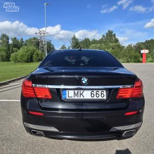 Black BMW 740 2010 in Utena, with an engine capacity of 3.00 L and mileage of 396 thousand km for 8200 €, photo 21 on AUTOMOTO.COM.LV