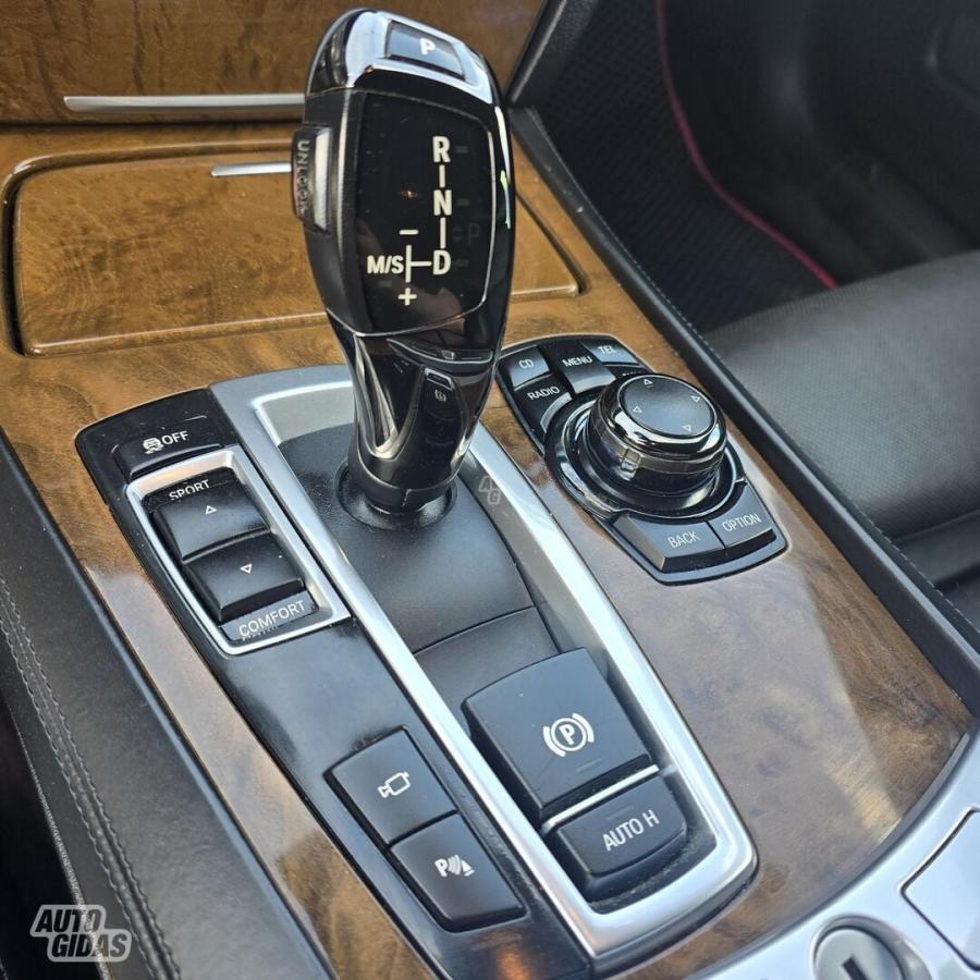 Black BMW 740 2010 in Utena, with an engine capacity of 3.00 L and mileage of 396 thousand km for 8200 €, photo 42 on AUTOMOTO.COM.LV