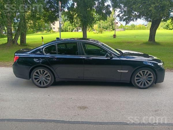 Melns BMW 740 2011 Ogre, ar dzinēja tilpumu 3.00 L un nobraukumu 262 tūkst. km par 12900 €, foto 6 vietnē AUTOMOTO.COM.LV