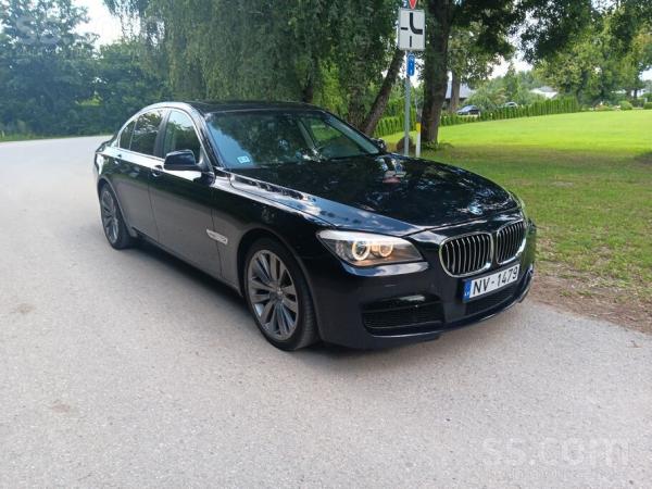 Melns BMW 740 2011 Ogre, ar dzinēja tilpumu 3.00 L un nobraukumu 262 tūkst. km par 12900 €, foto 7 vietnē AUTOMOTO.COM.LV