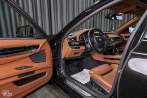 Black BMW 740 2011 in Marijampole, with an engine capacity of 3.00 L and mileage of 219 thousand km for 13850 €, photo 22 on AUTOMOTO.COM.LV