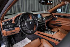 Black BMW 740 2011 in Marijampole, with an engine capacity of 3.00 L and mileage of 219 thousand km for 13850 €, photo 24 on AUTOMOTO.COM.LV